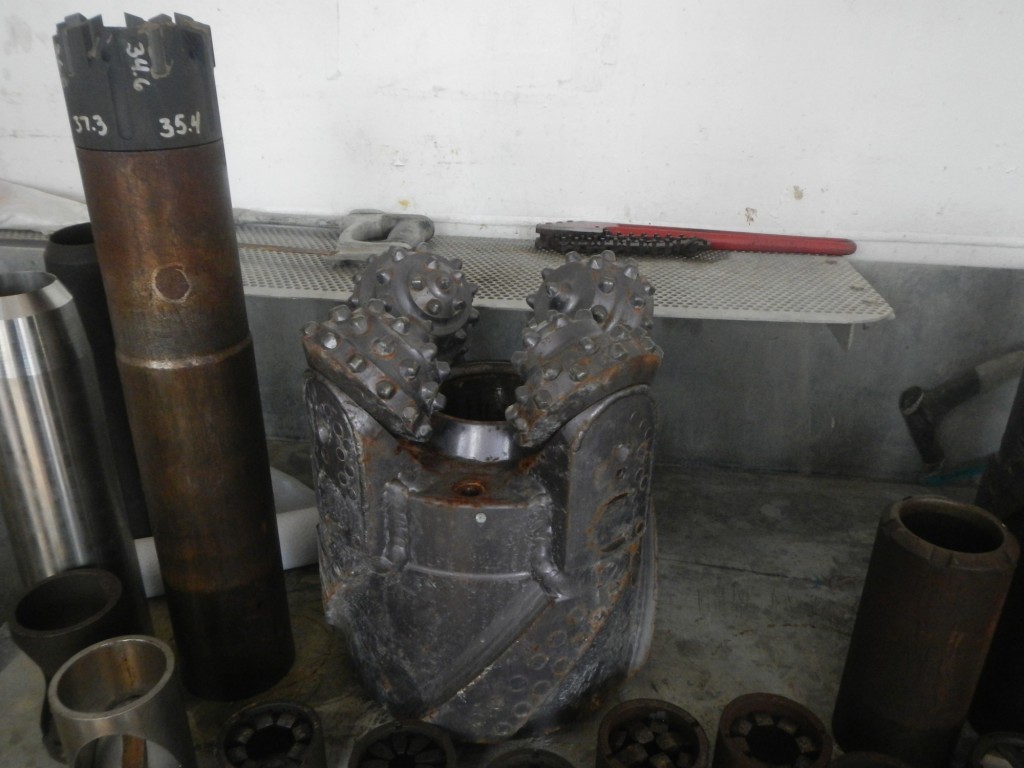 A rotary drill bit (center), two APC barrels (far left), an XCB ...